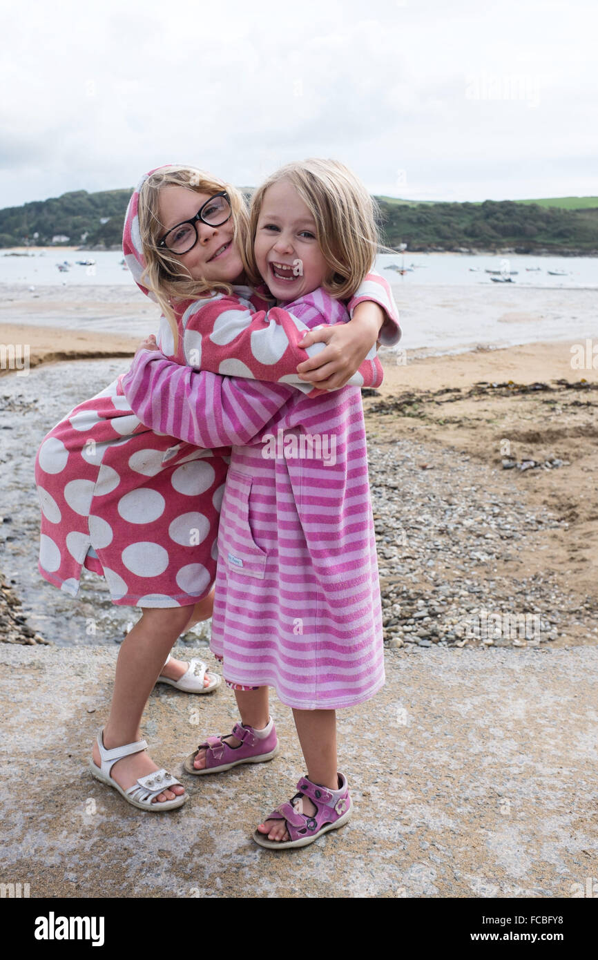 Two Girls Cuddling High Resolution Stock Photography and Images - Alamy