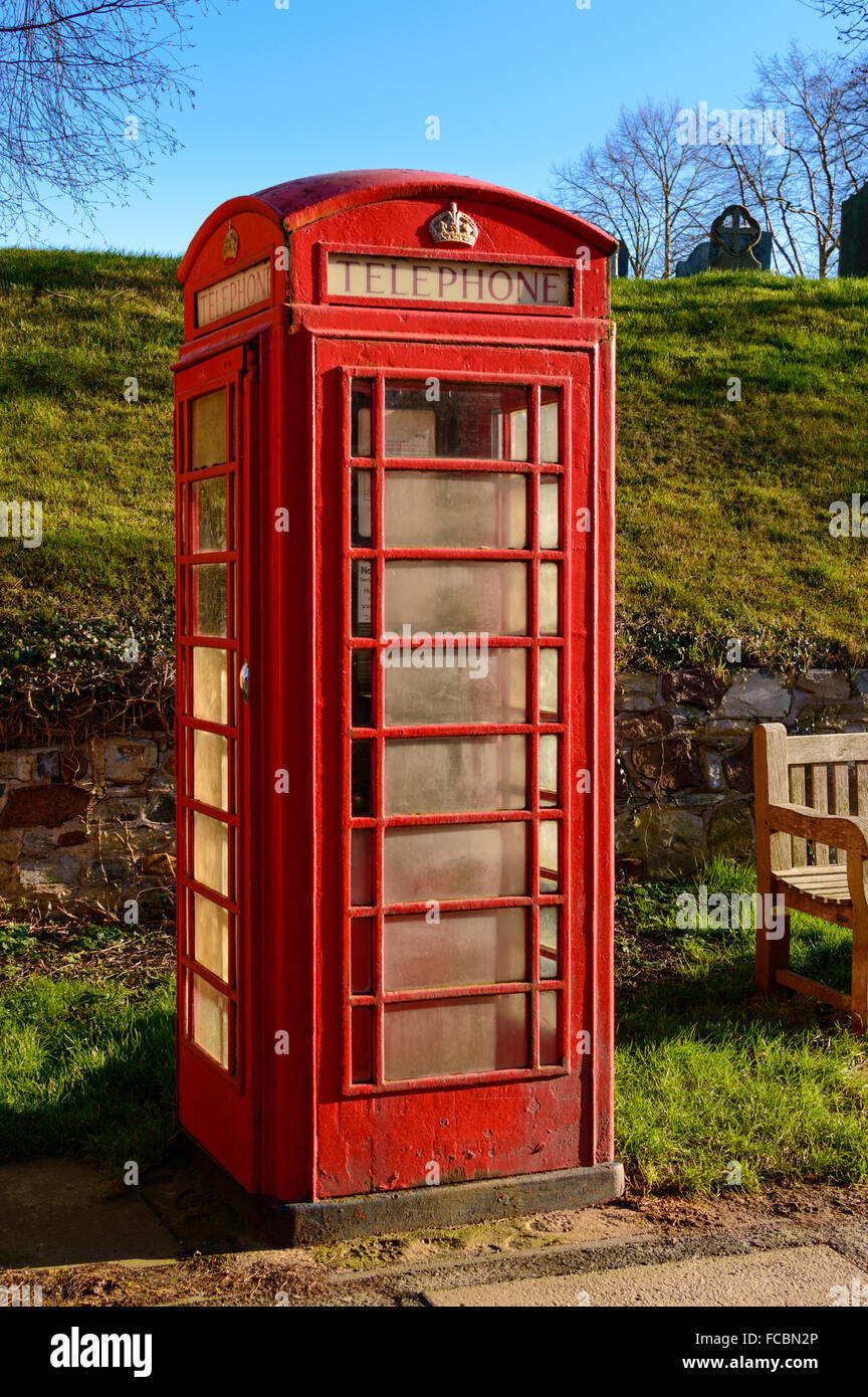 A rural British red traditional telephone box. In Wymeswold, England on ...