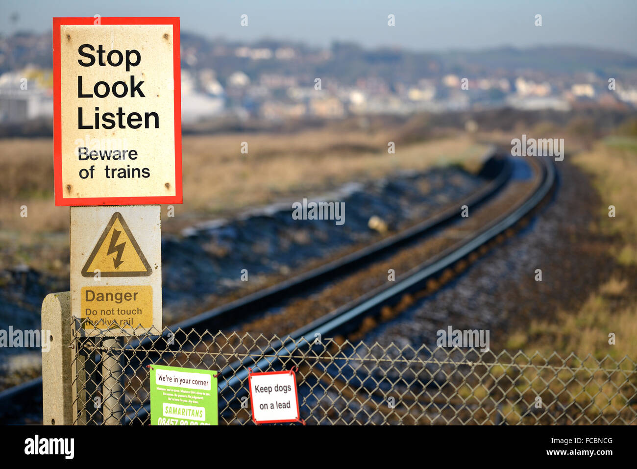 Stop look listen sign on single trail track. UK Stock Photo - Alamy