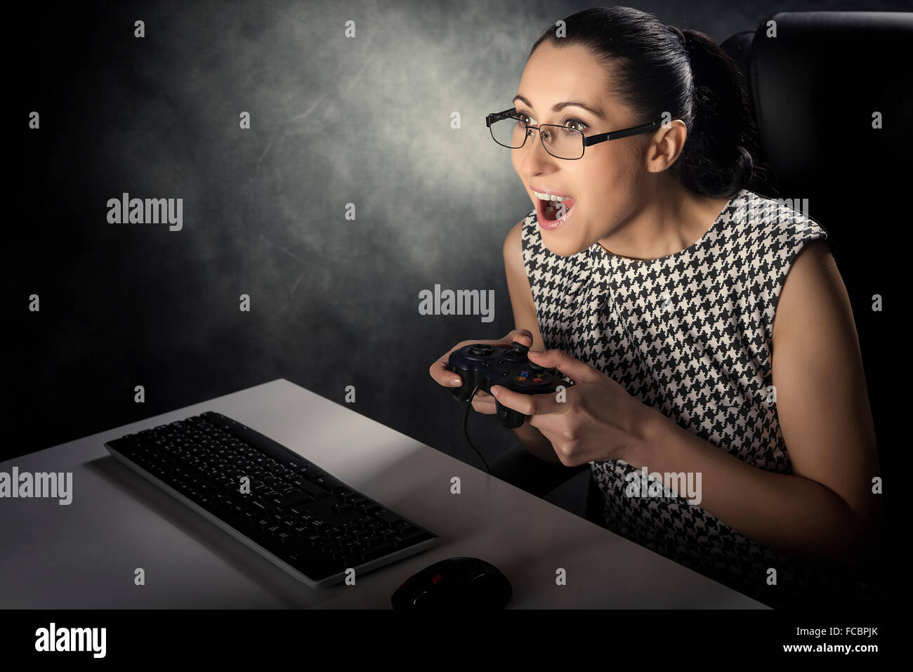Business woman playing computer games Stock Photo - Alamy