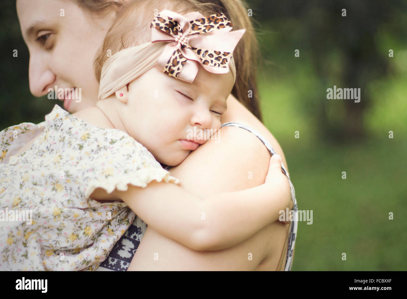 Child carrying a baby hi-res stock photography and images - Alamy