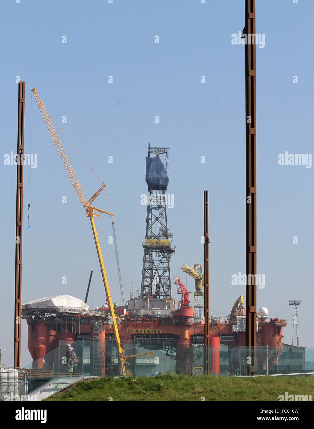 Tourists walk on the site of the Titanic slipway at Belfast Harbour ...