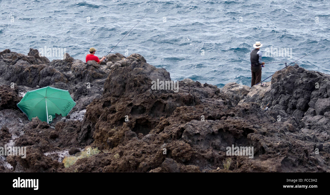 Men fishing in Callao Salveje Tenerife Stock Photo - Alamy