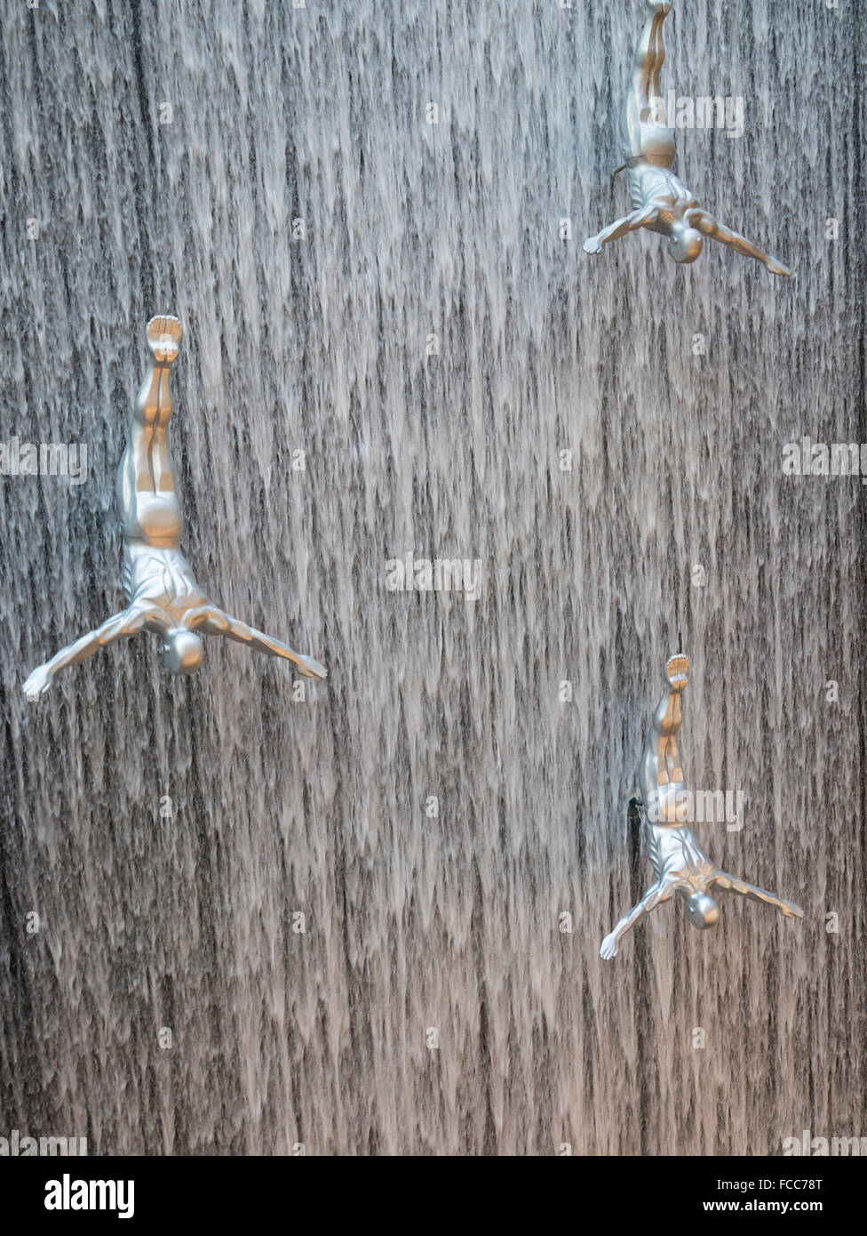 Waterfall and Human Diver Sculpture in Dubai Mall Stock Photo - Alamy