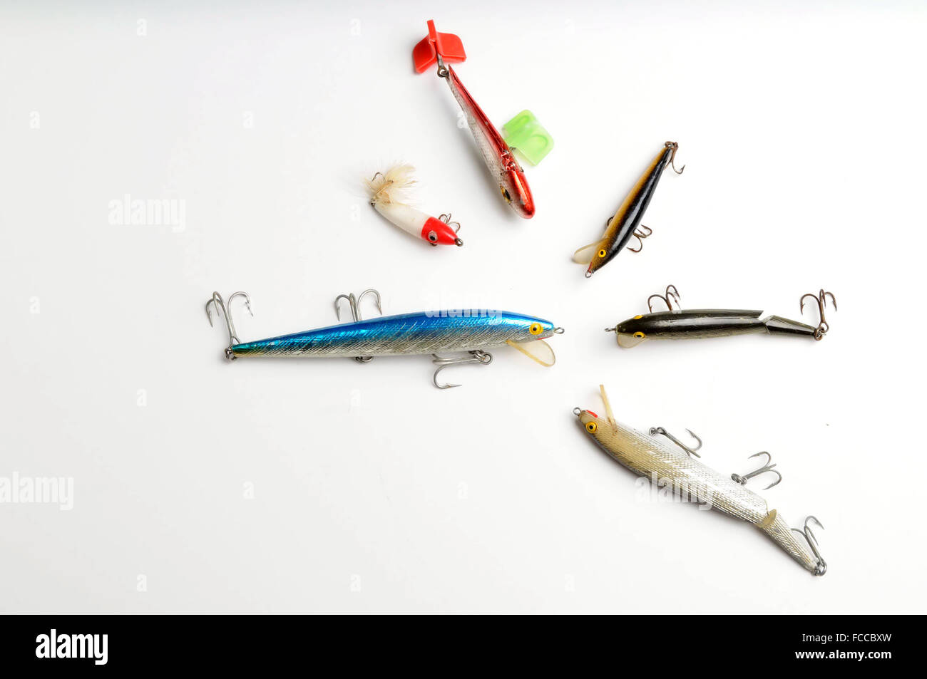 Fishing lures with white backdrop Stock Photo - Alamy