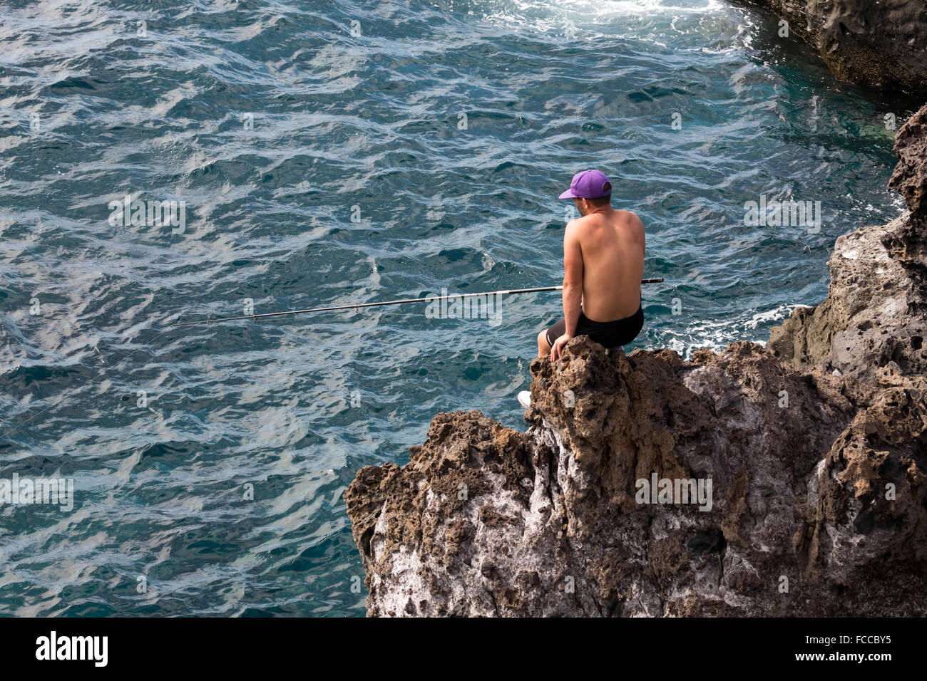Man fishing in Callao Salveje Tenerife Stock Photo - Alamy