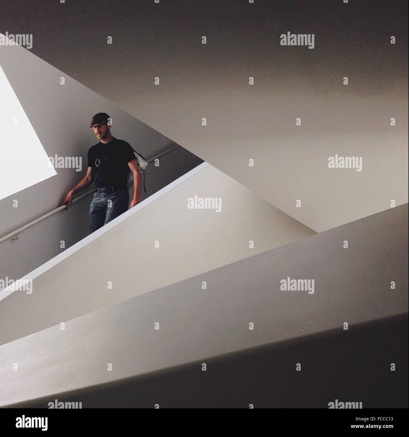 Man alone stairs hi-res stock photography and images - Alamy