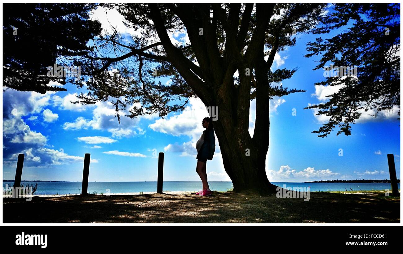 Leaning At A Tree High Resolution Stock Photography and Images - Alamy