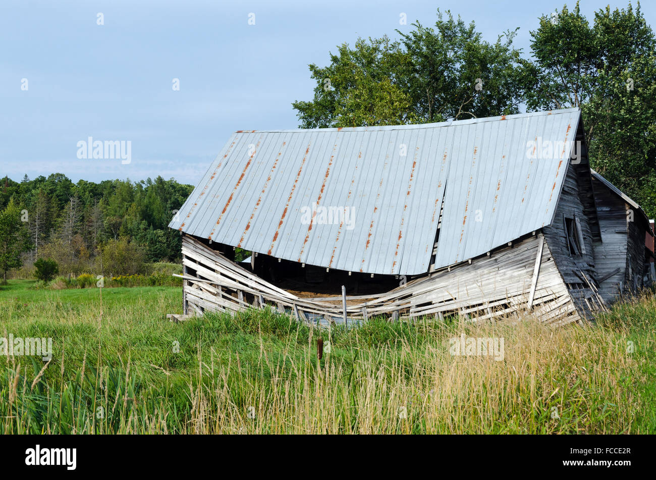 Ruins old barn in farmland at sunset Stock Photo - Alamy