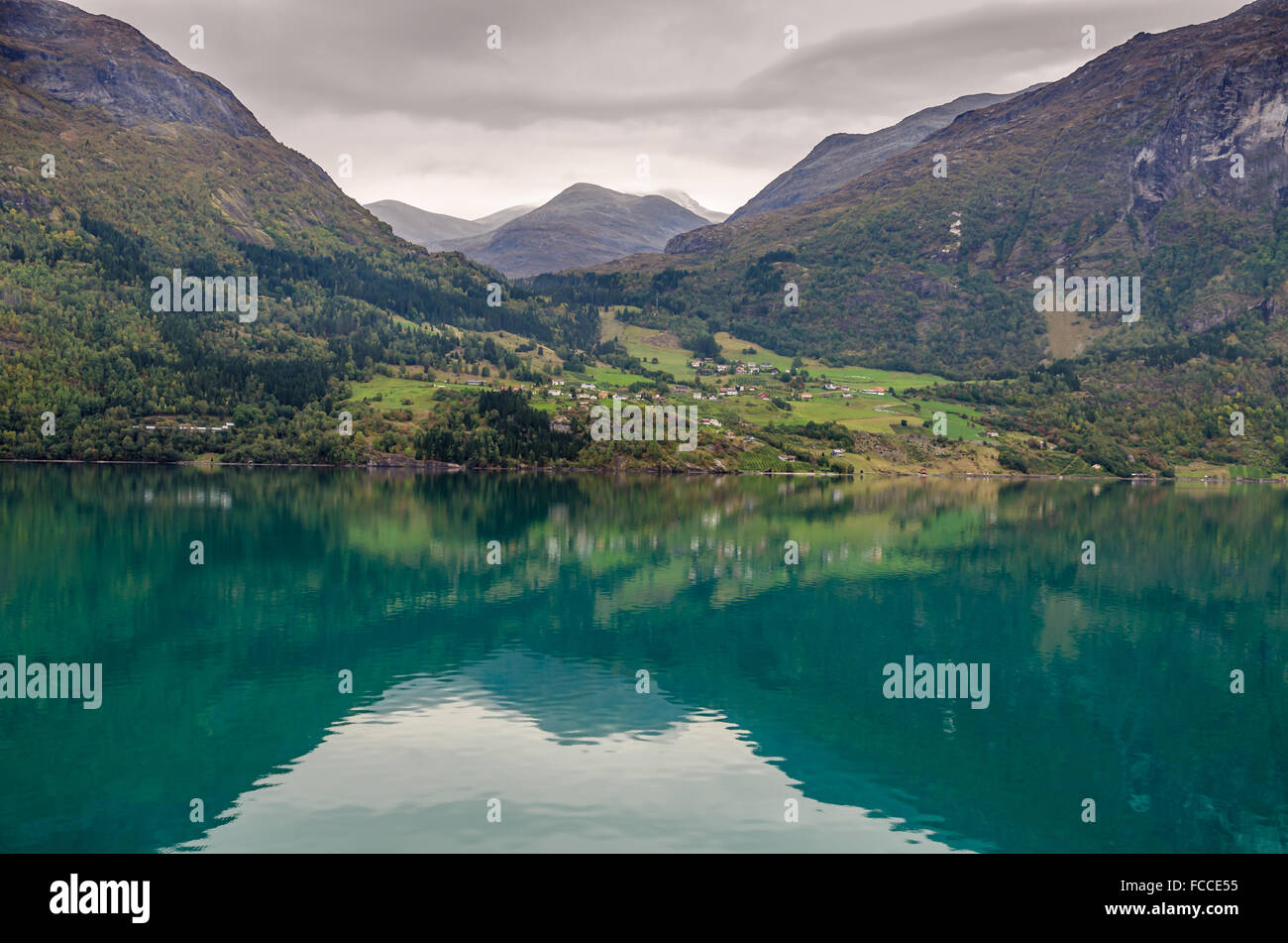 Reflection in Norway fjord at fall time Stock Photo - Alamy
