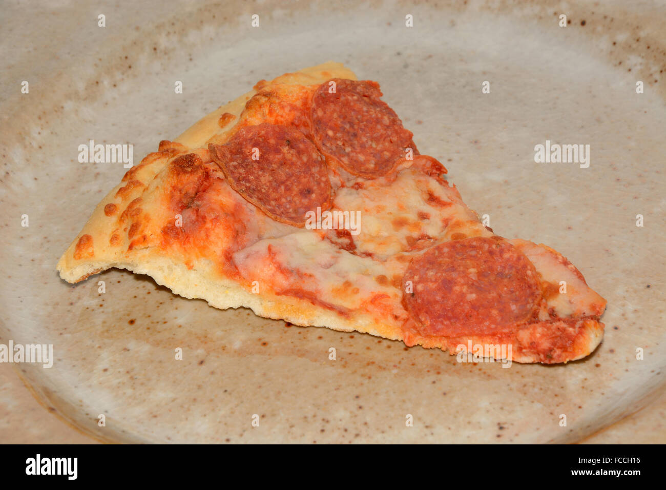 Cold leftover pepperoni pizza Stock Photo - Alamy