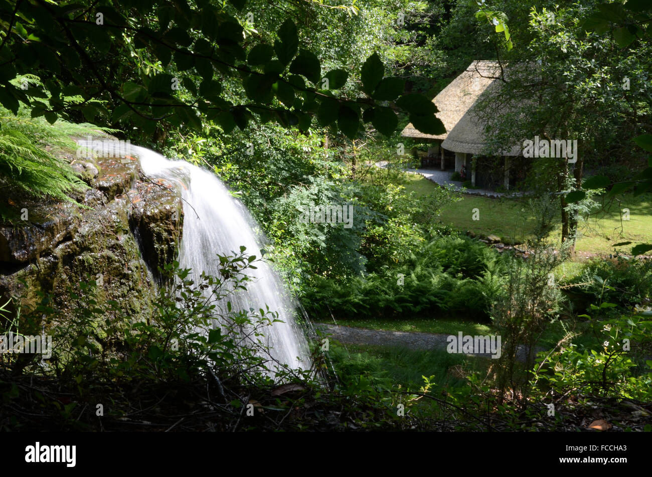 House and waterfall hi-res stock photography and images - Alamy