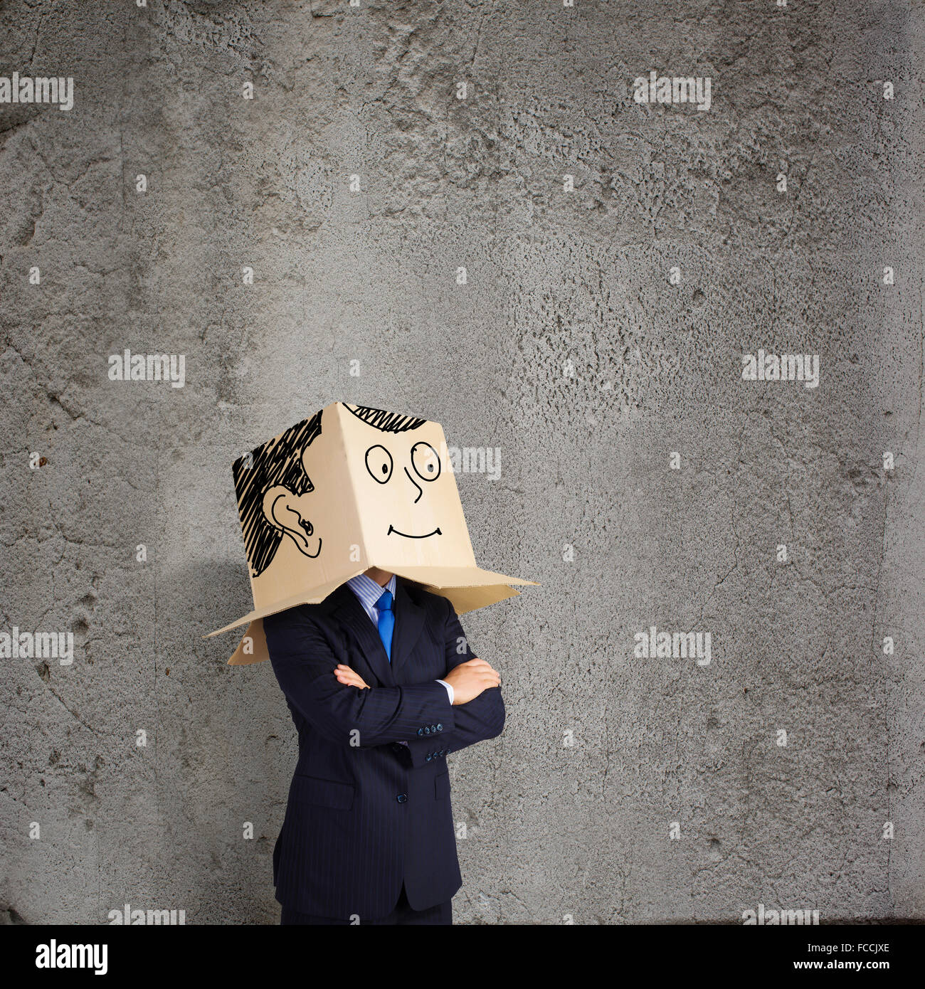Businessman with box on head showing different emotions Stock Photo - Alamy