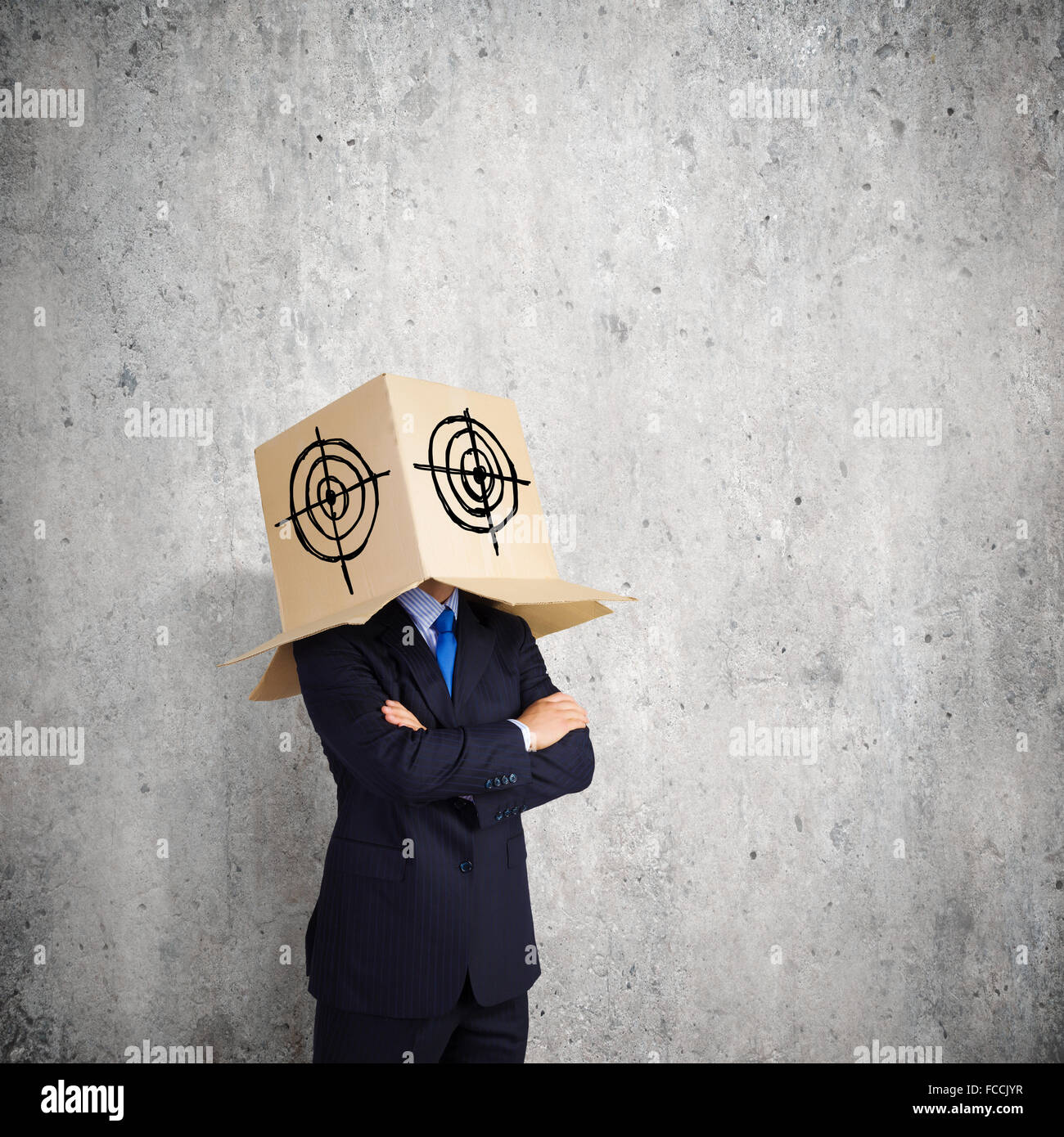 Businessman with box on head expressing emotions Stock Photo - Alamy
