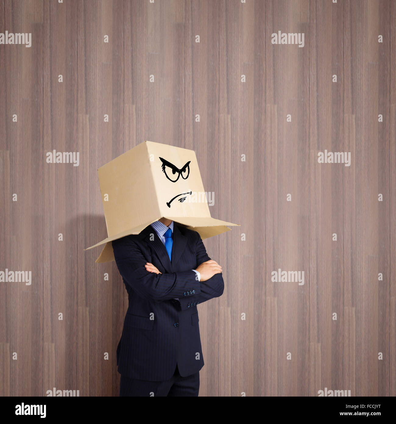 Businessman with box on head showing different emotions Stock Photo - Alamy