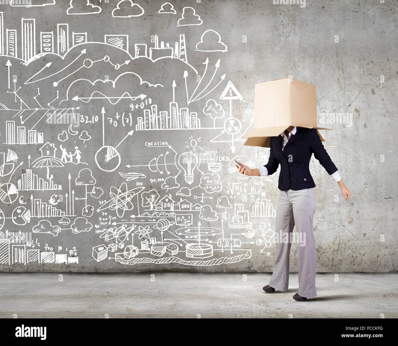 Conceptual image of businesswoman with carton box on head Stock Photo ...