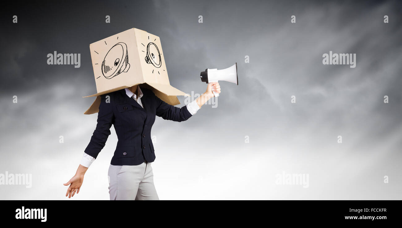 Conceptual image of businesswoman with carton box on head Stock Photo ...