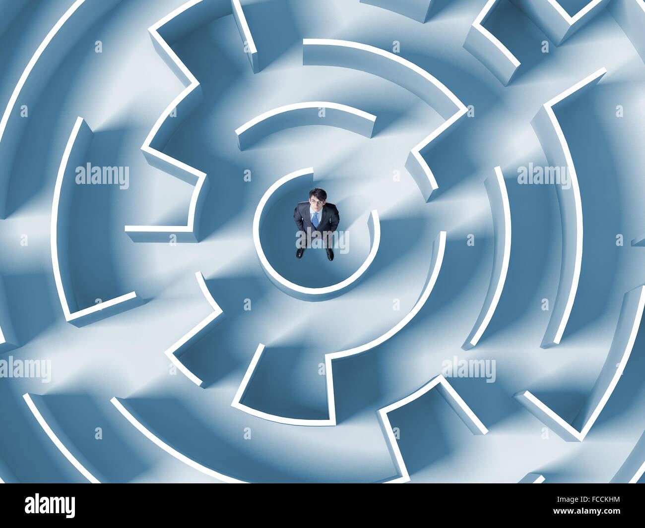 Businessman standing in center of the maze hi-res stock photography and ...