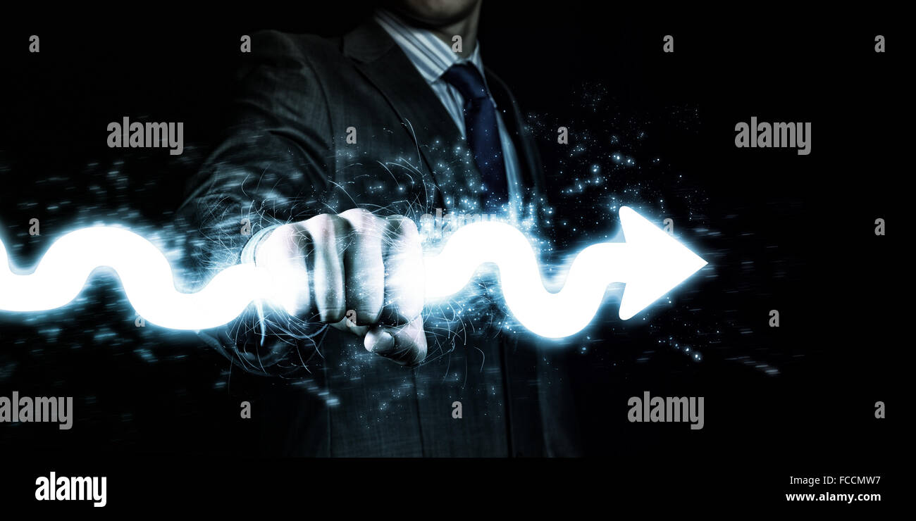 Businessman holding lightning in fist. Power and control Stock Photo ...