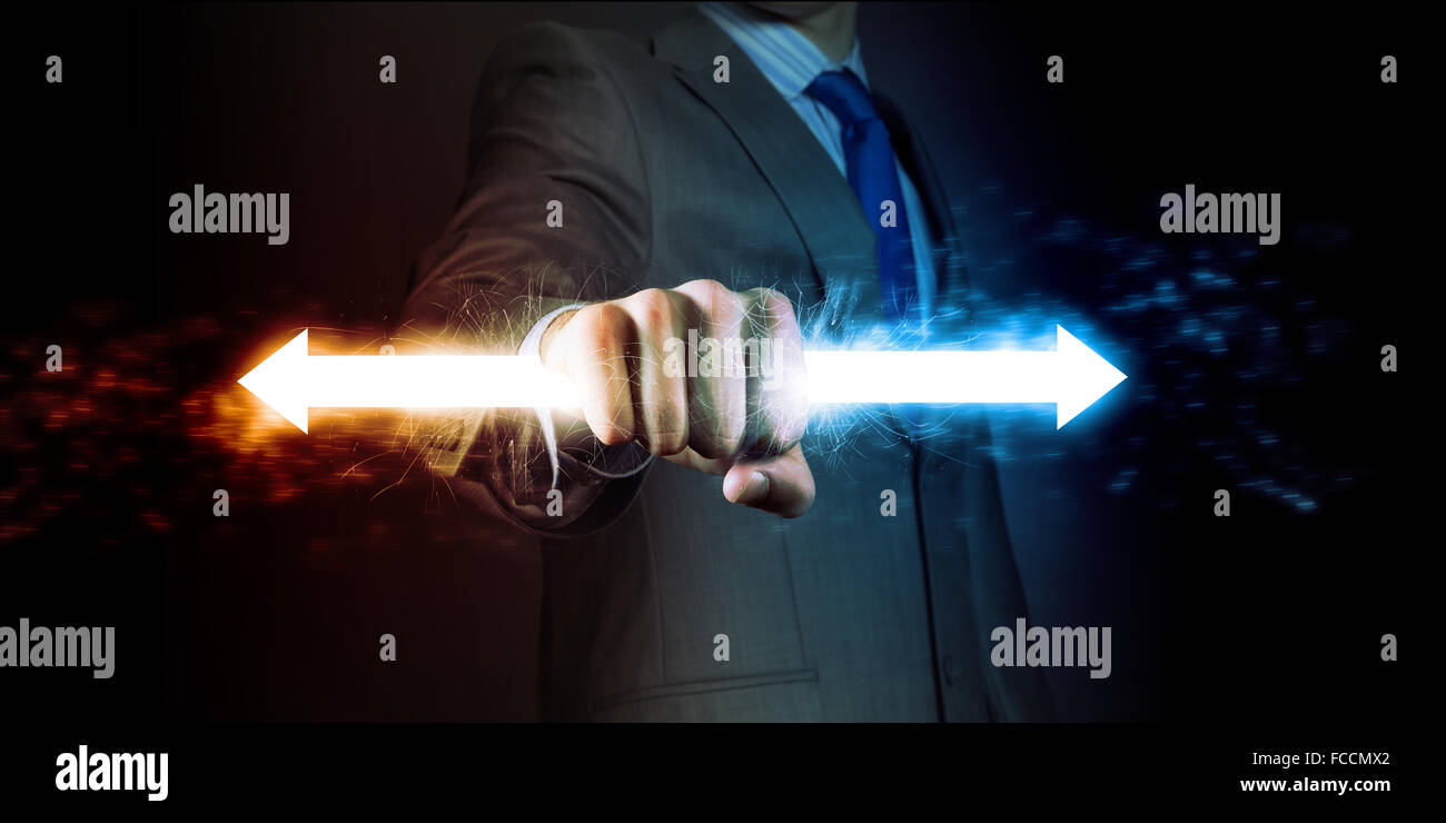 Businessman holding lightning in fist. Power and control Stock Photo ...