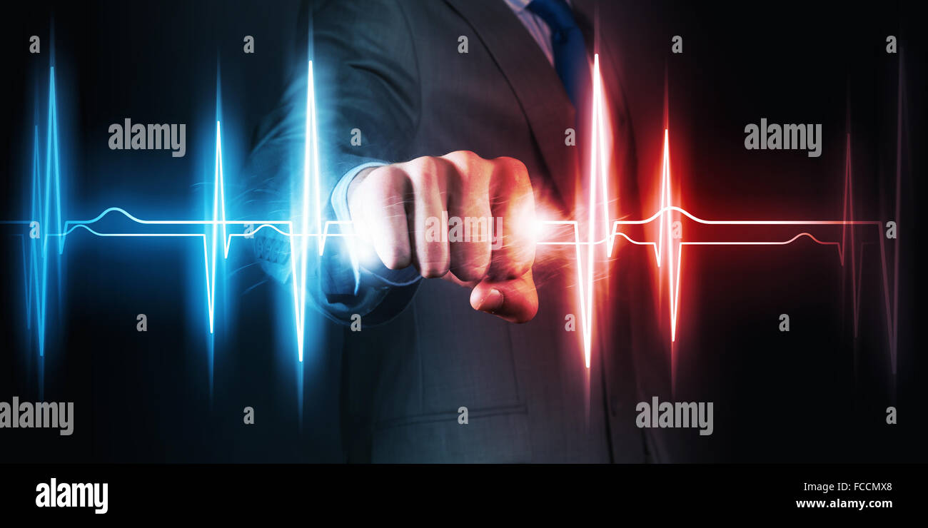 Businessman holding lightning in fist hi-res stock photography and ...