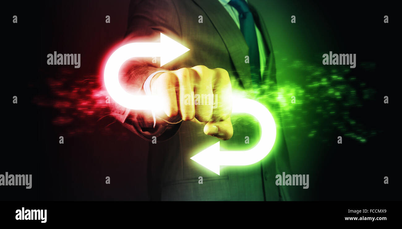 Businessman holding lightning in fist hi-res stock photography and ...