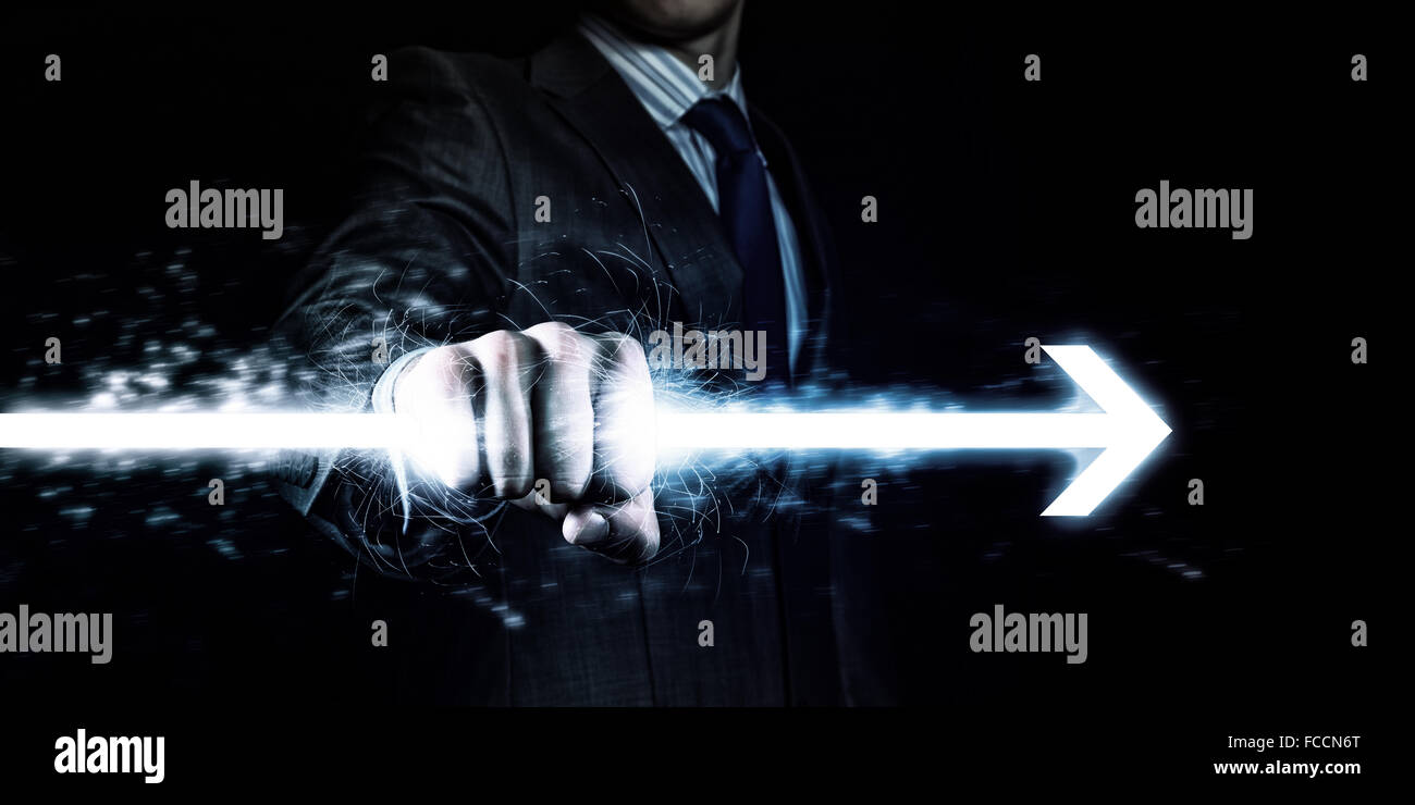 Businessman holding lightning in fist. Power and control Stock Photo ...