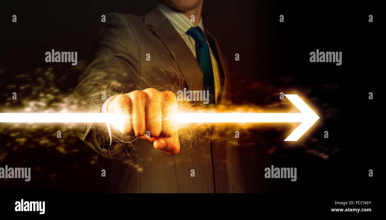 Businessman holding lightning in fist hi-res stock photography and ...