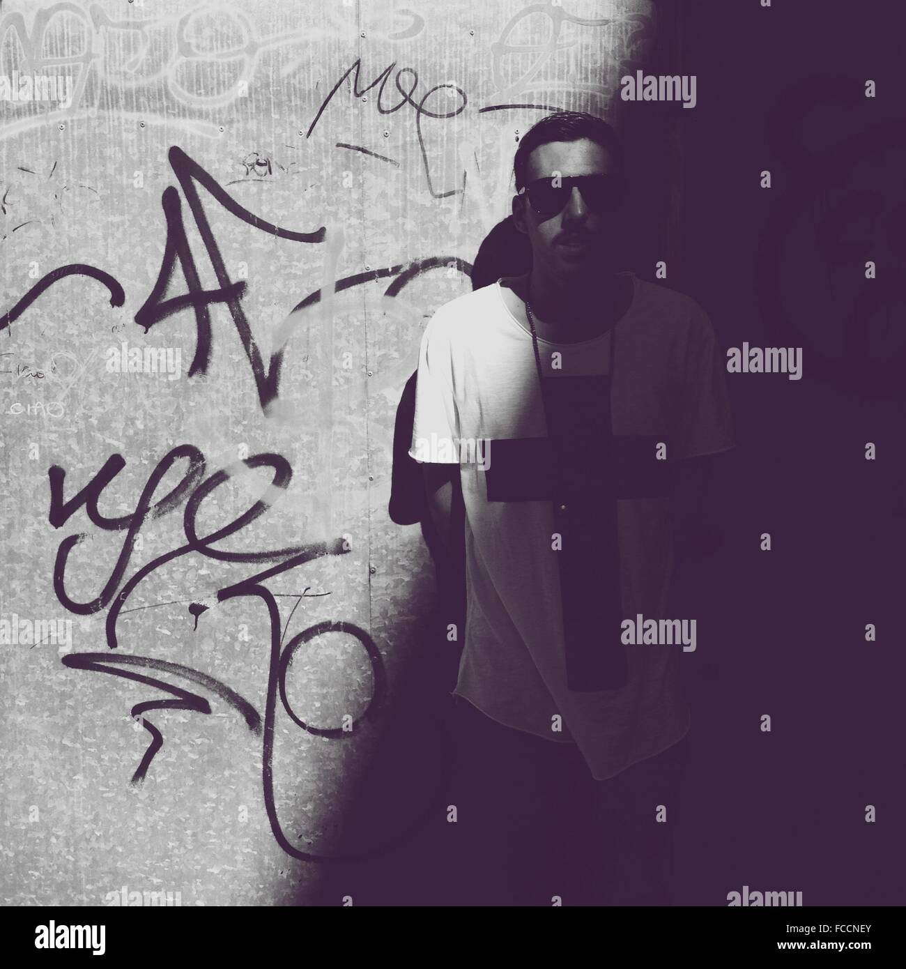 Graffiti Building Men Standing High Resolution Stock Photography and ...