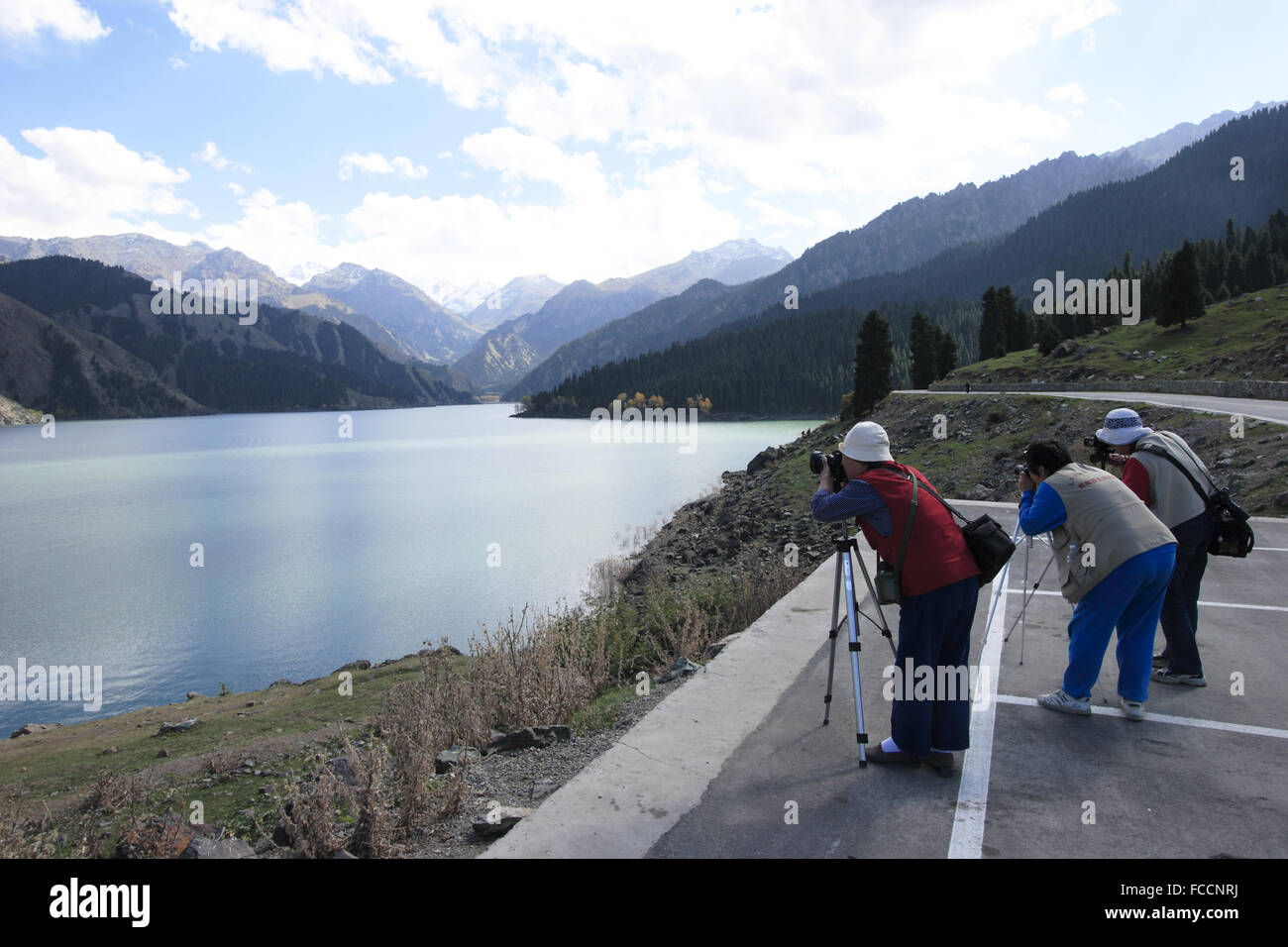Tourists taking photos of Tianchi Lake (Heaven Lake of Tianshan) in ...