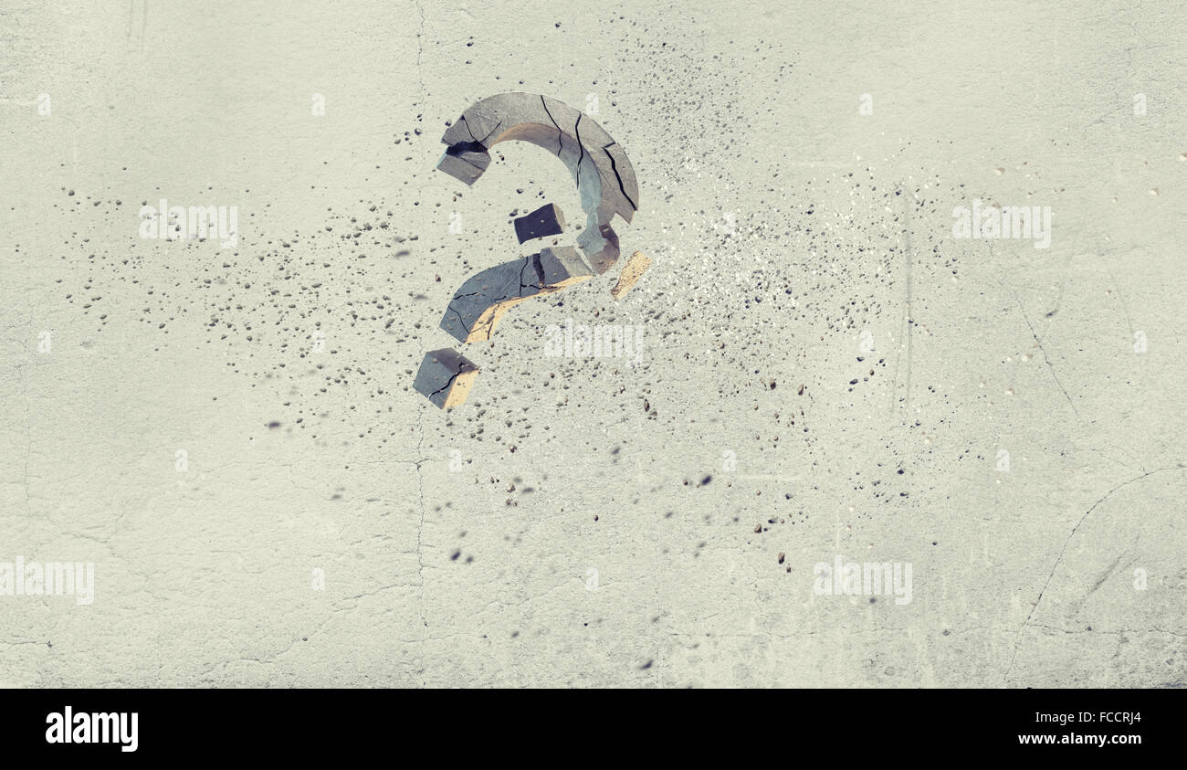 Conceptual image with stone broken question mark Stock Photo - Alamy