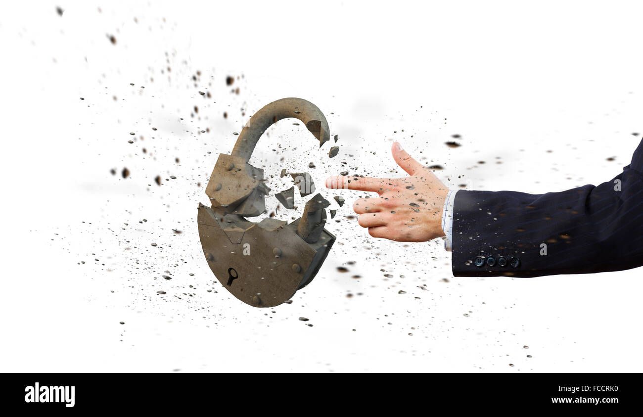 Businessman crushing stone lock with finger touch Stock Photo - Alamy