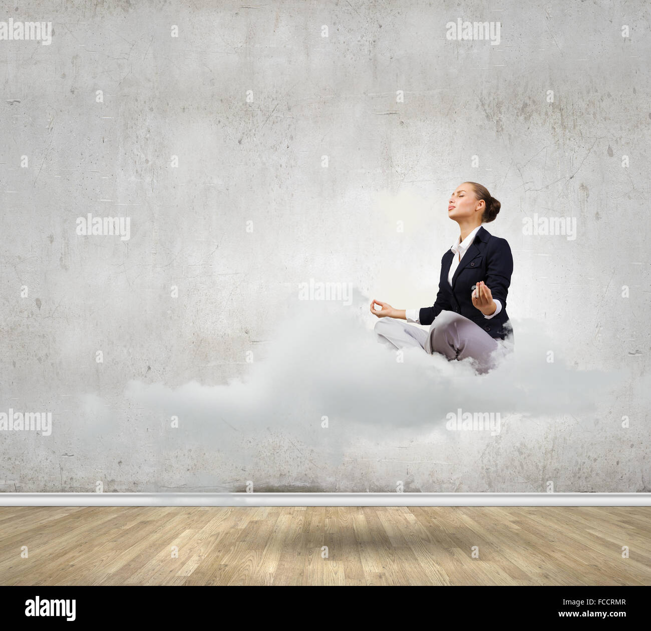 Young attractive woman sitting on cloud and meditating Stock Photo - Alamy