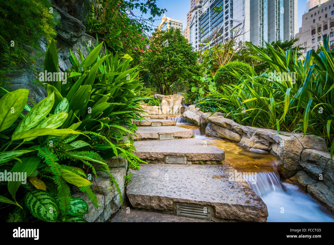 Steps and small cascading waterfall at Cheung Kong Park, Hong Kong ...