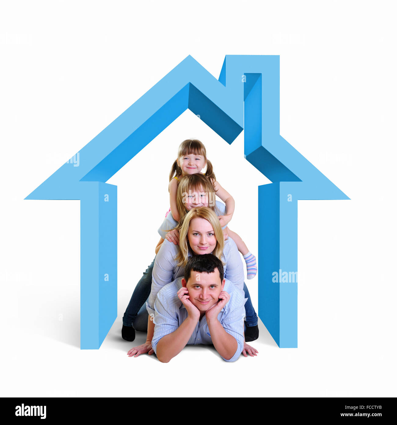 Happy young family with children in house Stock Photo - Alamy