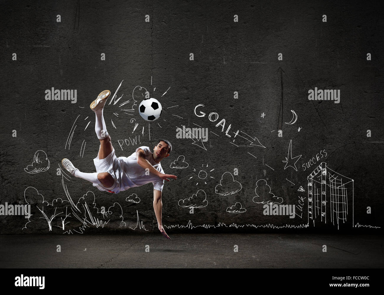 Football player in jump striking ball with sketches at backdrop Stock ...