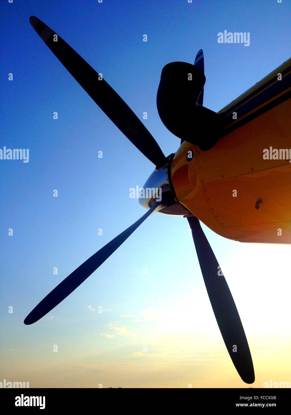 Airplane Propeller In The Sunset Stock Photo - Alamy