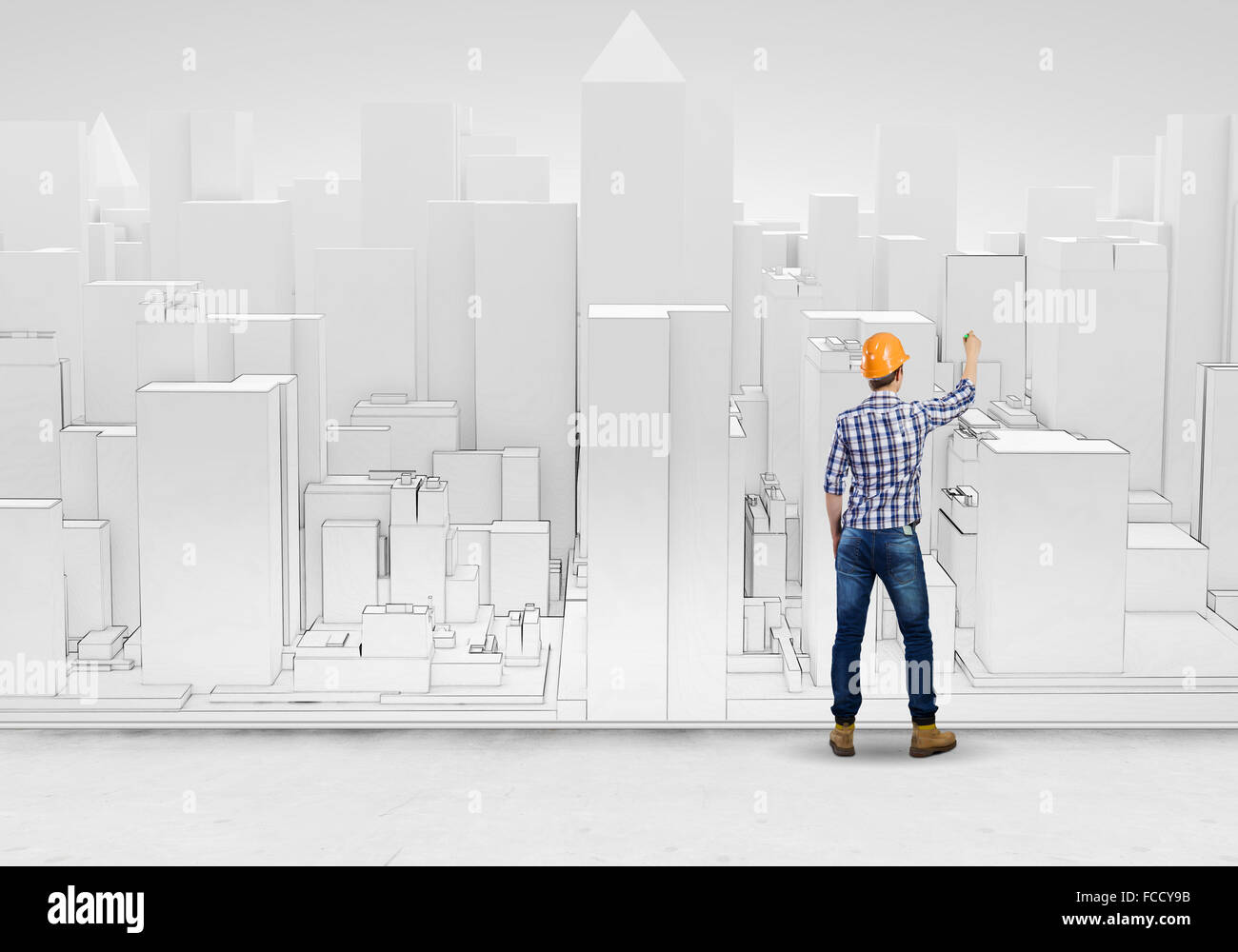 Back view of man engineer drawing buildings Stock Photo - Alamy
