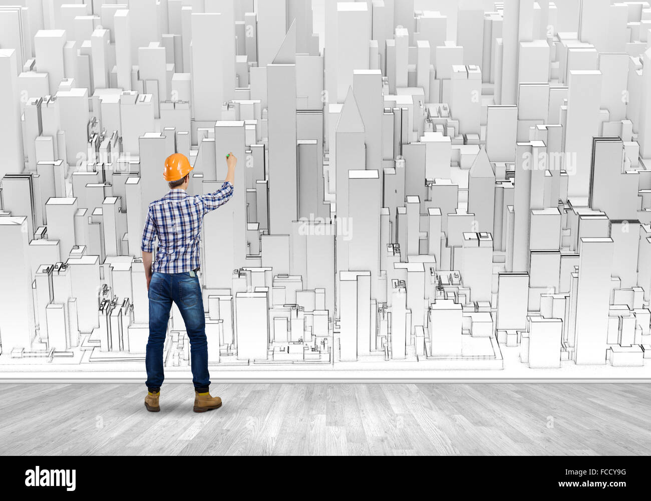 Back view of man engineer drawing buildings Stock Photo - Alamy