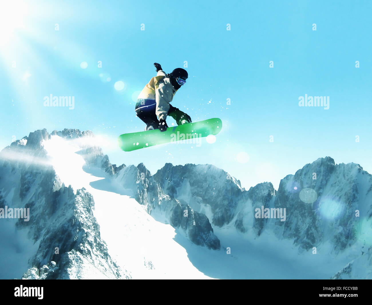 Snowboarder making jump high in clear sky Stock Photo - Alamy