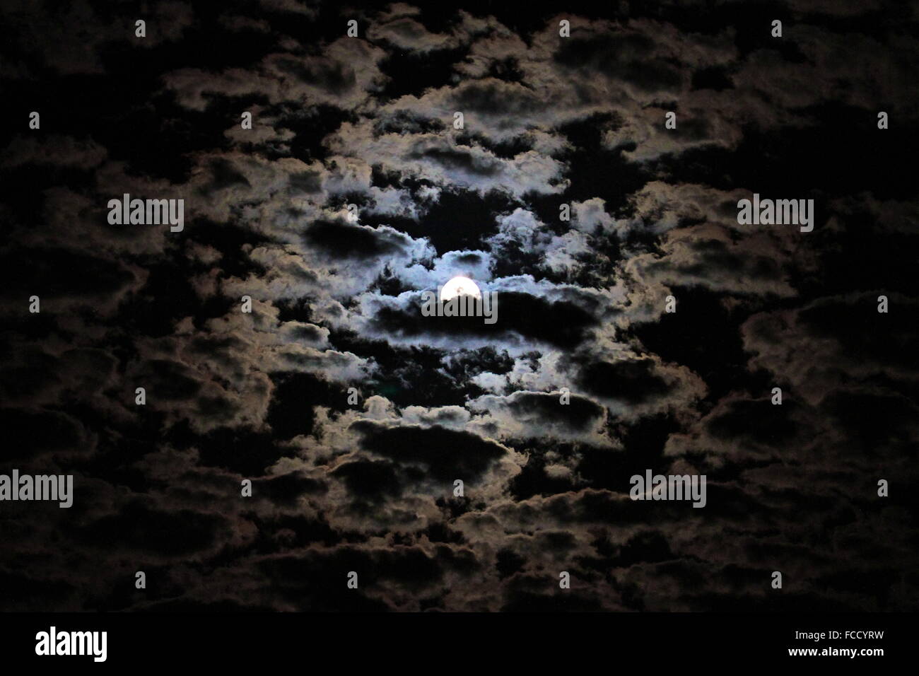 Full moon behind clouds night hi-res stock photography and images - Alamy
