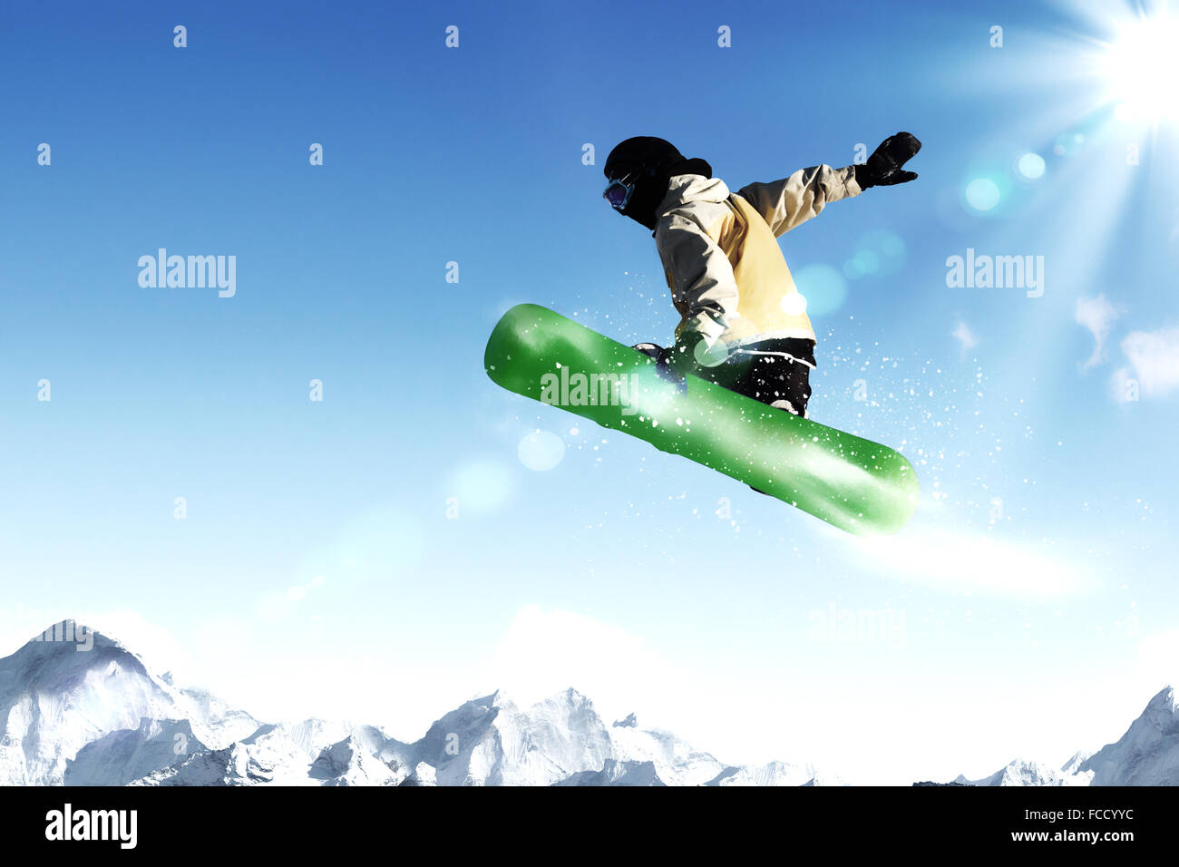 Snowboarder making jump high in clear sky Stock Photo - Alamy