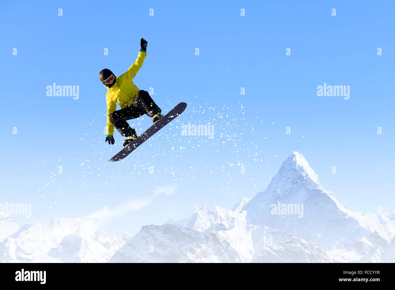 Snowboarder making jump high in clear sky Stock Photo - Alamy