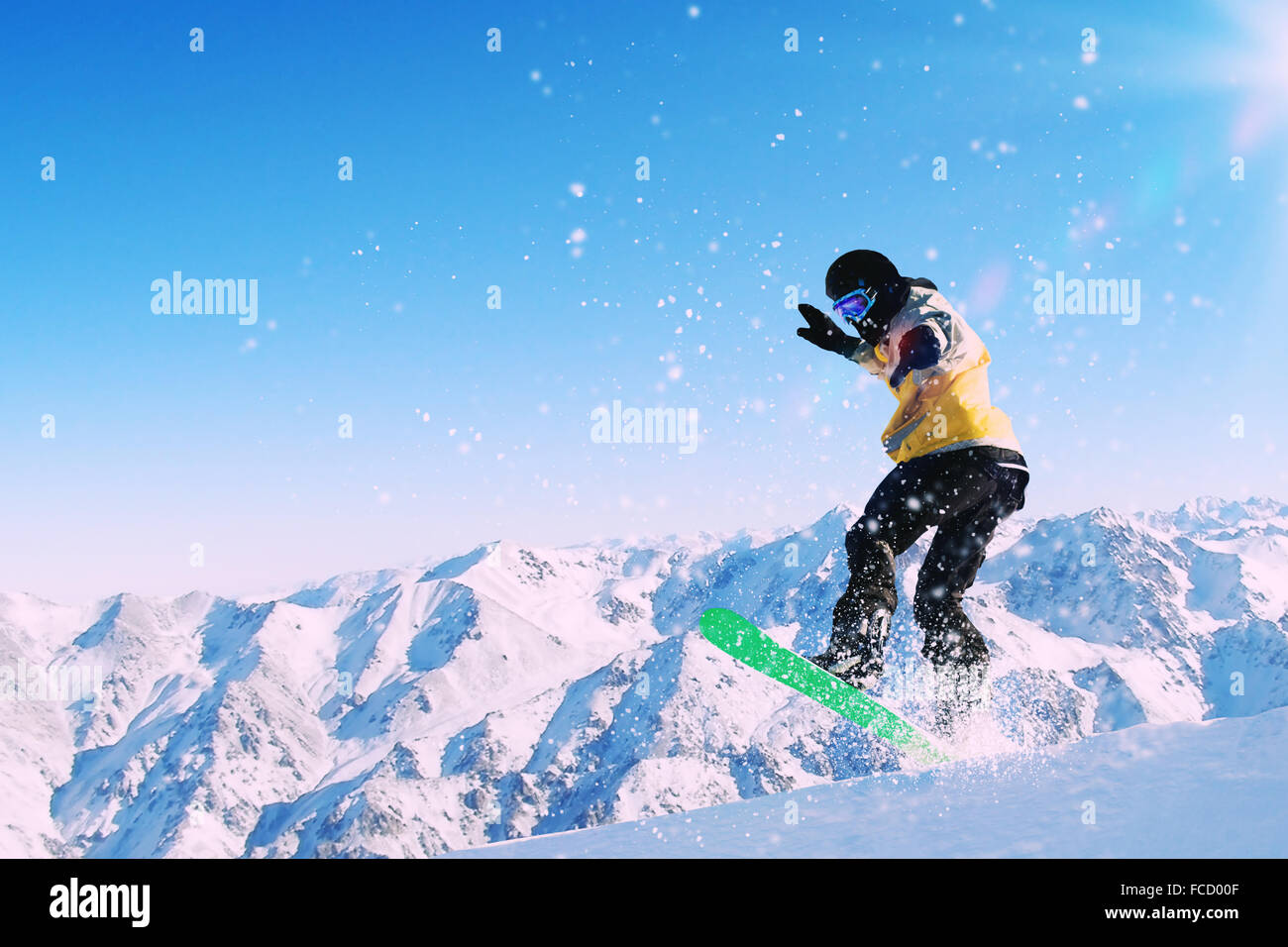 Snowboarder making jump high in clear sky Stock Photo - Alamy