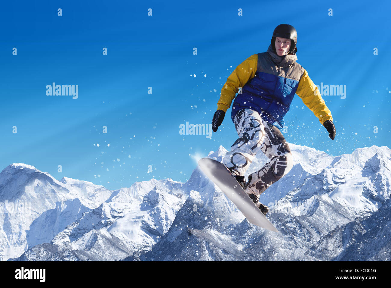 Snowboarder making jump high in clear sky Stock Photo - Alamy
