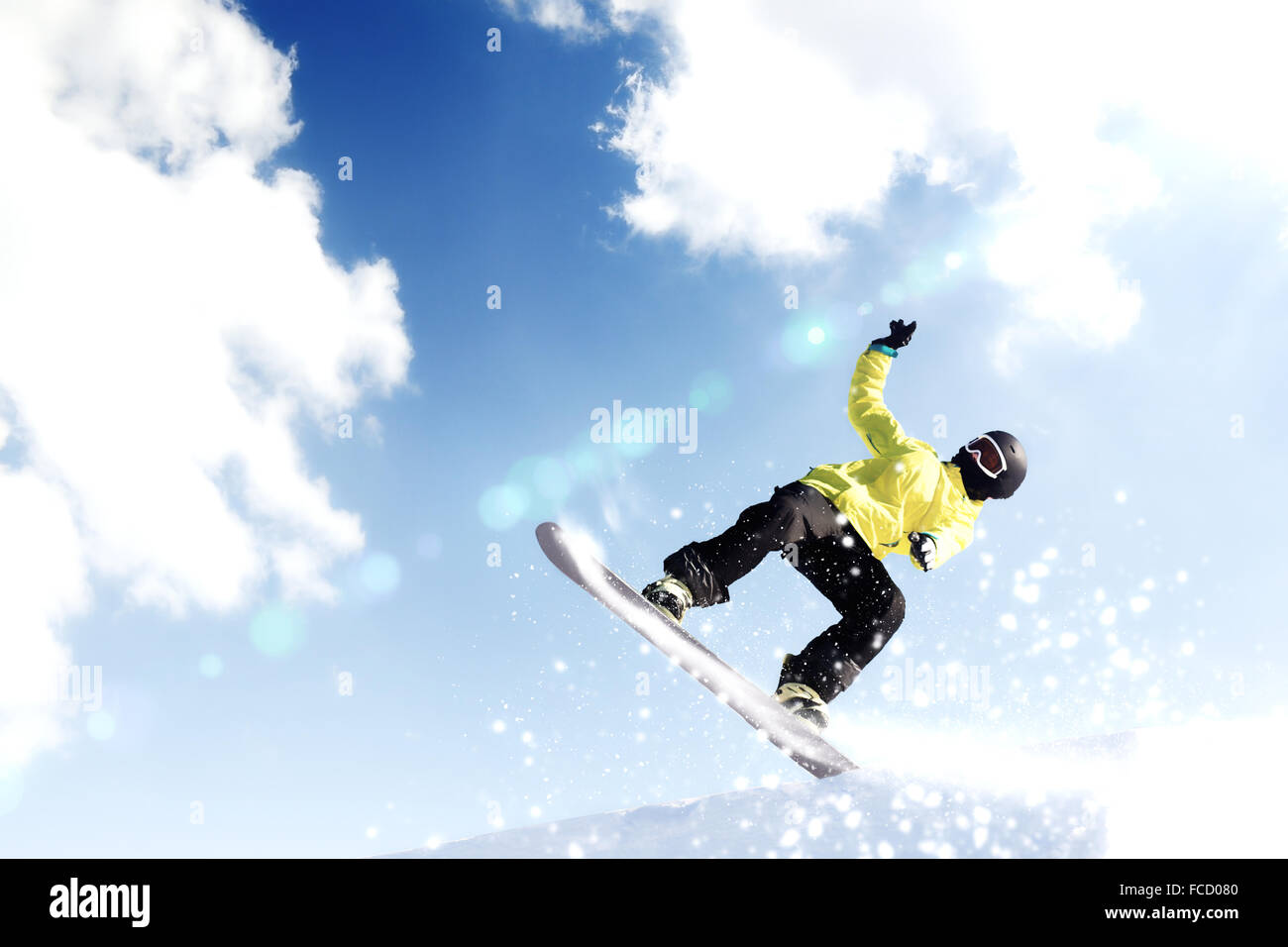 Snowboarder making jump high in clear sky Stock Photo - Alamy