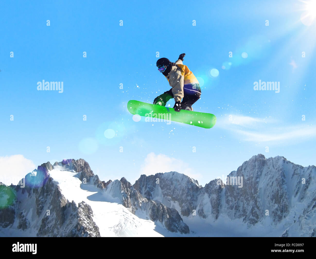 Man on snowboard jumping in sky. Summer vacation Stock Photo - Alamy