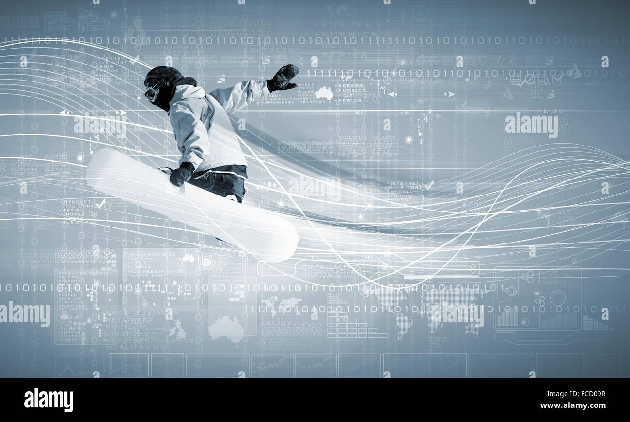Male snowboarder making jump against media background Stock Photo - Alamy
