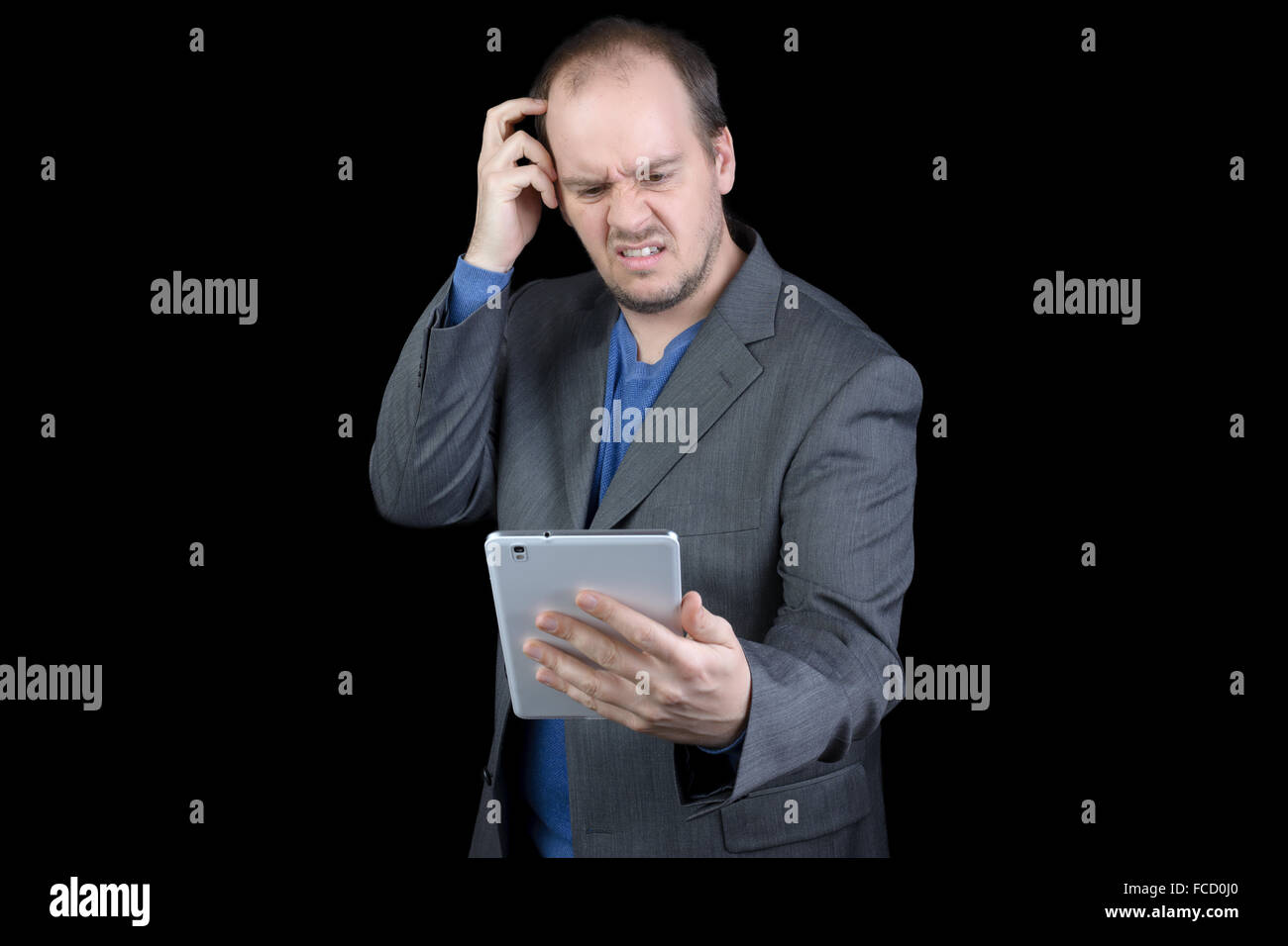Confused man and computer hi-res stock photography and images - Alamy