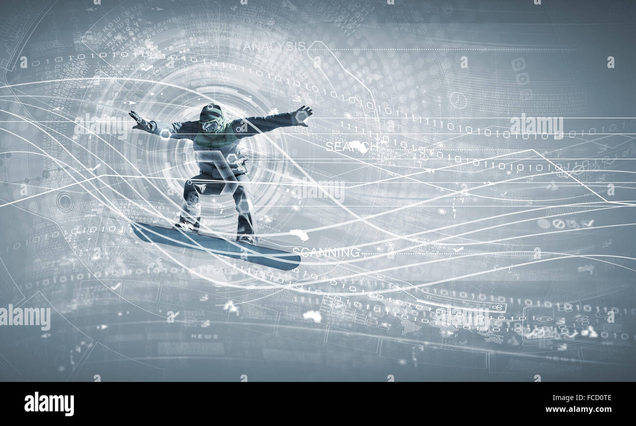 Male snowboarder making jump against media background Stock Photo - Alamy